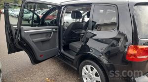 Black Volkswagen Touran 2014 in Riga, with an engine capacity of 1.20 L and mileage of 220 thousand km for 6500 €, photo 32 on AUTOMOTO.COM.LV