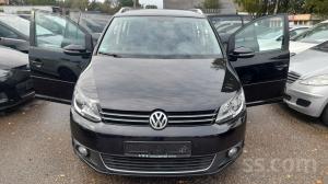 Black Volkswagen Touran 2014 in Riga, with an engine capacity of 1.20 L and mileage of 220 thousand km for 6500 €, photo 36 on AUTOMOTO.COM.LV