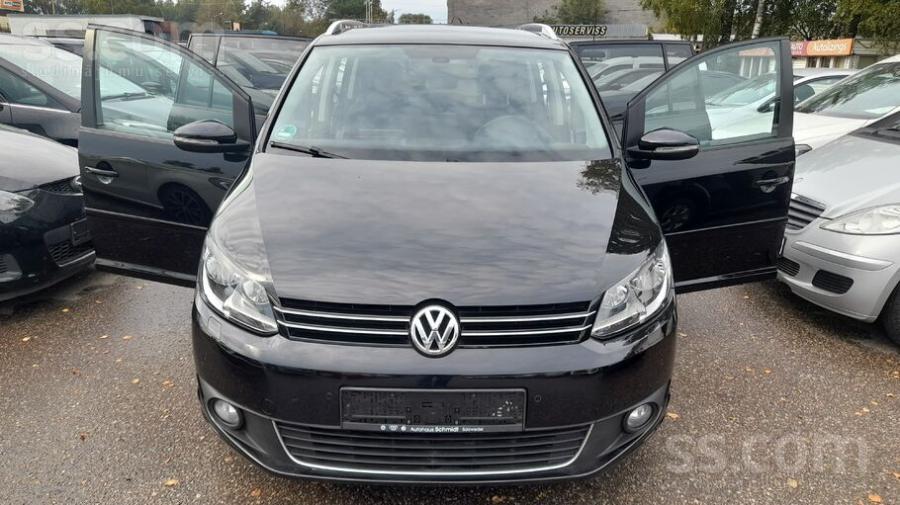 Black Volkswagen Touran 2014 in Riga, with an engine capacity of 1.20 L and mileage of 220 thousand km for 6500 €, photo 36 on AUTOMOTO.COM.LV