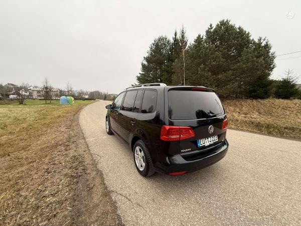 Black Volkswagen Touran 2015 in Utena, with an engine capacity of 1.60 L and mileage of 212 thousand km for 6700 €, photo 6 on AUTOMOTO.COM.LV
