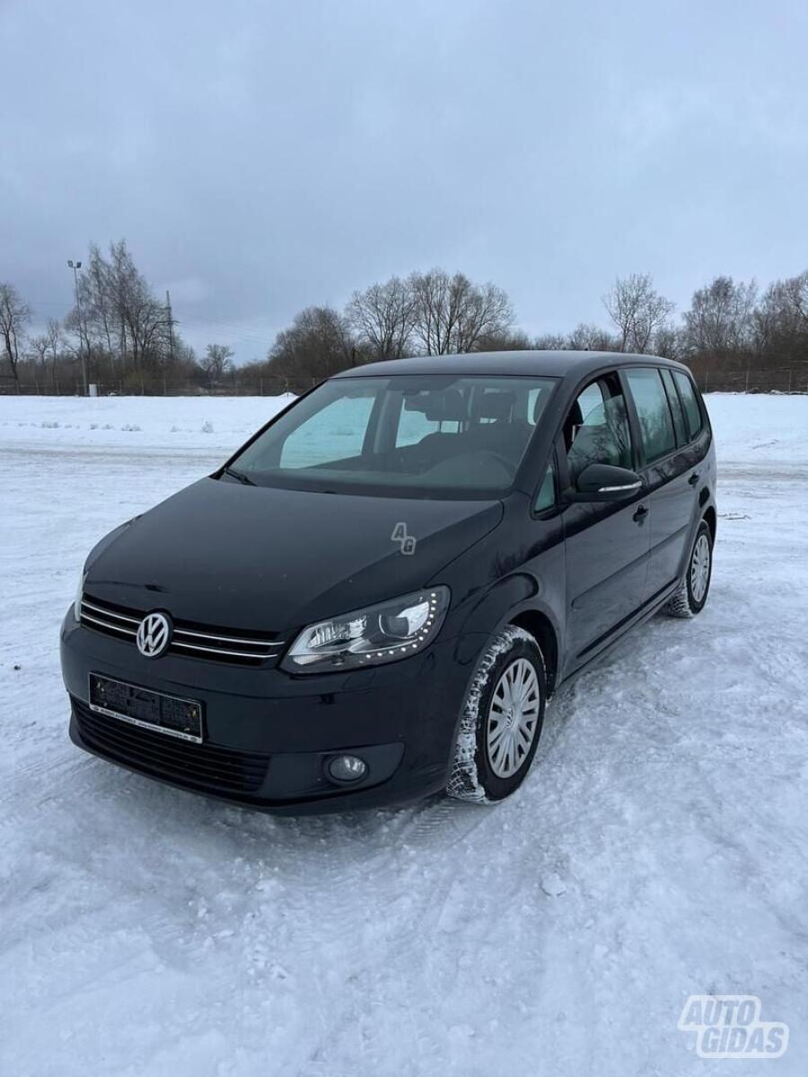 Black Volkswagen Touran 2015 in Marijampole, with an engine capacity of 1.60 L and mileage of 248 thousand km for 5750 €, photo 1 on AUTOMOTO.COM.LV