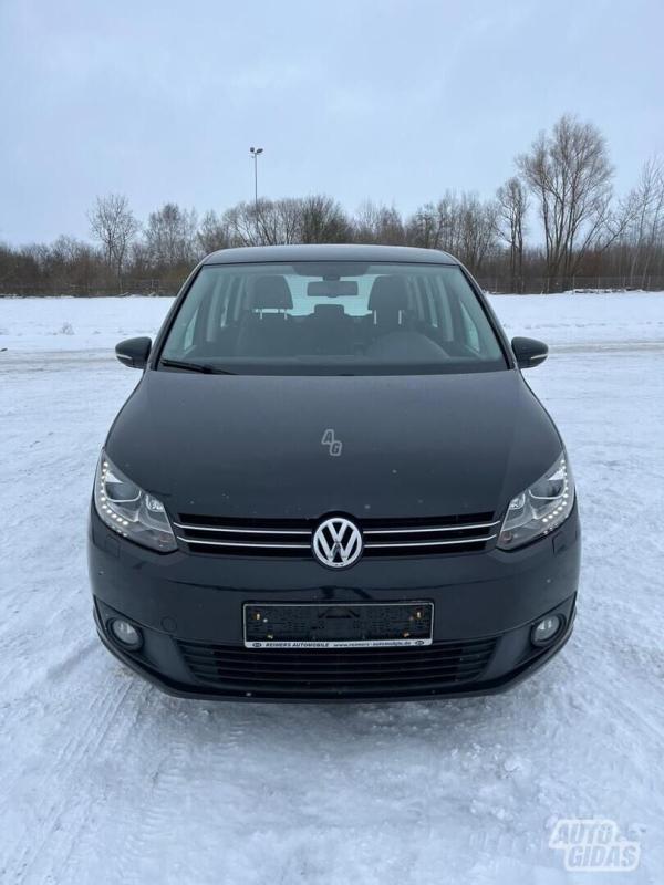 Black Volkswagen Touran 2015 in Marijampole, with an engine capacity of 1.60 L and mileage of 248 thousand km for 5750 €, photo 2 on AUTOMOTO.COM.LV