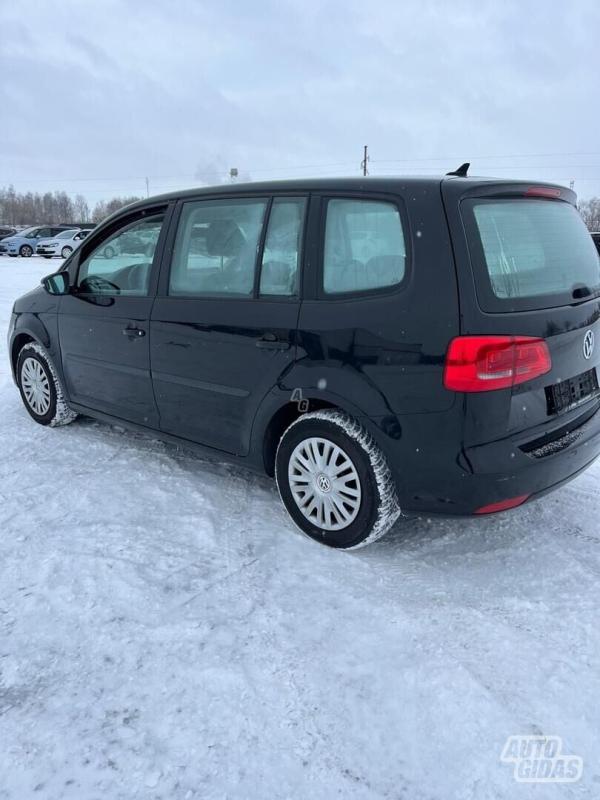 Black Volkswagen Touran 2015 in Marijampole, with an engine capacity of 1.60 L and mileage of 248 thousand km for 5750 €, photo 4 on AUTOMOTO.COM.LV