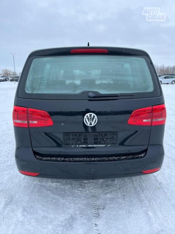 Black Volkswagen Touran 2015 in Marijampole, with an engine capacity of 1.60 L and mileage of 248 thousand km for 5750 €, photo 7 on AUTOMOTO.COM.LV