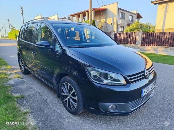 Black Volkswagen Touran 2015 in Vilnius, with an engine capacity of 1.60 L and mileage of 275 thousand km for 8200 €, photo 3 on AUTOMOTO.COM.LV