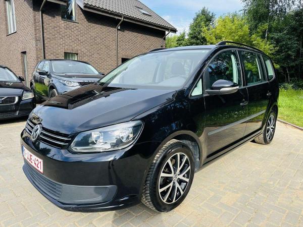 Black Volkswagen Touran 2015 in Kaunas, with an engine capacity of 1.60 L and mileage of 242 thousand km for 7100 €, photo 3 on AUTOMOTO.COM.LV