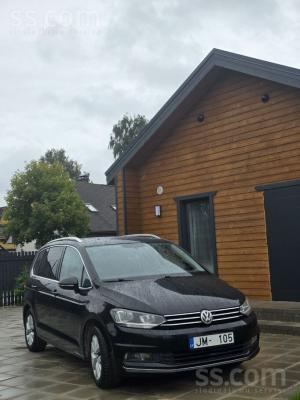 Melns Volkswagen Touran 2015 Rīga, ar dzinēja tilpumu 1.60 L un nobraukumu 290 tūkst. km par 9900 €, foto  vietnē AUTOMOTO.COM.LV