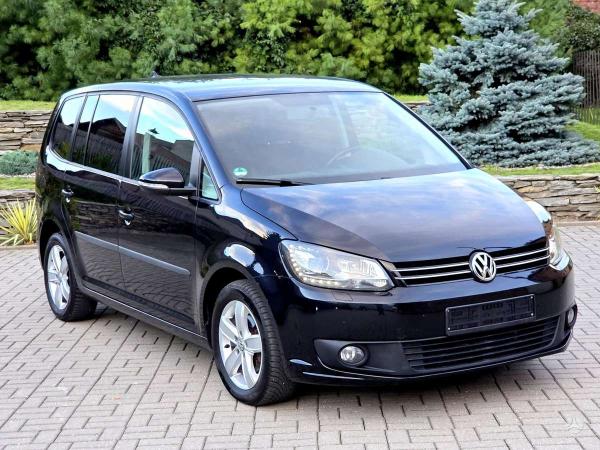 Black Volkswagen Touran 2015 in Kedainiai, with an engine capacity of 1.60 L and mileage of 263 thousand km for 6650 €, photo 1 on AUTOMOTO.COM.LV