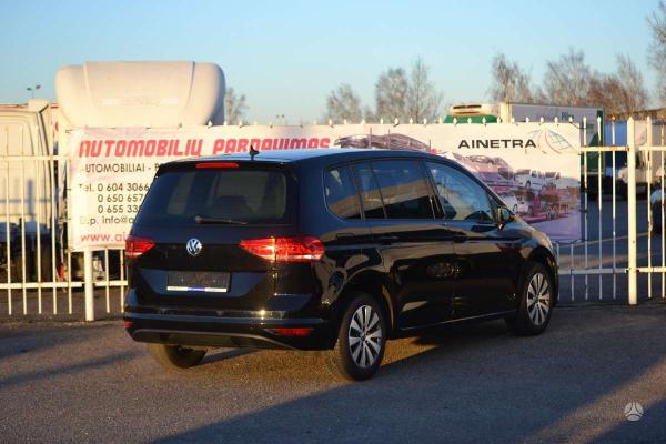 Black Volkswagen Touran 2016 in Marijampole, with an engine capacity of 1.60 L and mileage of 187 thousand km for 10500 €, photo 5 on AUTOMOTO.COM.LV