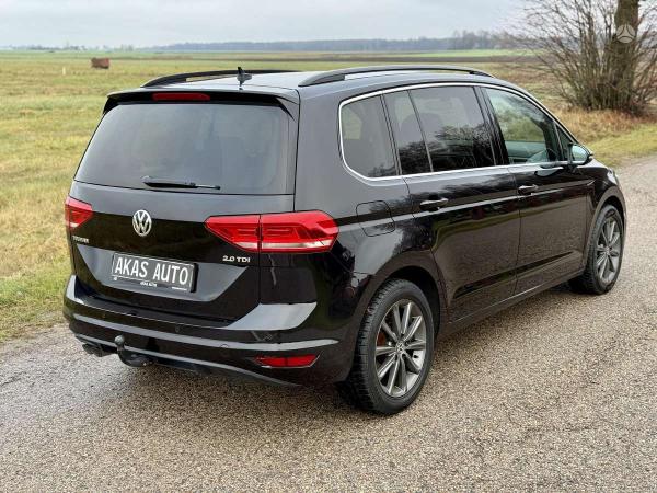 Black Volkswagen Touran 2016 in Siauliai, with an engine capacity of 1.97 L and mileage of 238 thousand km for 11200 €, photo 3 on AUTOMOTO.COM.LV