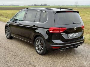 Black Volkswagen Touran 2016 in Siauliai, with an engine capacity of 1.97 L and mileage of 238 thousand km for 11200 €, photo 4 on AUTOMOTO.COM.LV
