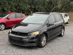 Black Volkswagen Touran 2016 in Ukmerge, with an engine capacity of 1.60 L and mileage of 216 thousand km for 6250 €, photo  on AUTOMOTO.COM.LV