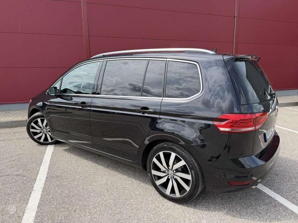 Black Volkswagen Touran 2016 in Kaunas, with an engine capacity of 2.00 L and mileage of 240 thousand km for 12900 €, photo 5 on AUTOMOTO.COM.LV