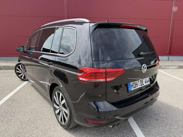 Black Volkswagen Touran 2016 in Kaunas, with an engine capacity of 2.00 L and mileage of 240 thousand km for 12900 €, photo 7 on AUTOMOTO.COM.LV