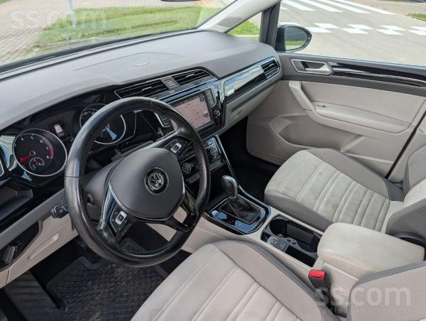 Black Volkswagen Touran 2016 in Riga, with an engine capacity of 1.80 L and mileage of 101 thousand km for 15000 €, photo 4 on AUTOMOTO.COM.LV