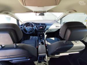 Black Volkswagen Touran 2016 in Ramuciai, with an engine capacity of 2.00 L and mileage of 218 thousand km for 10950 €, photo 3 on AUTOMOTO.COM.LV