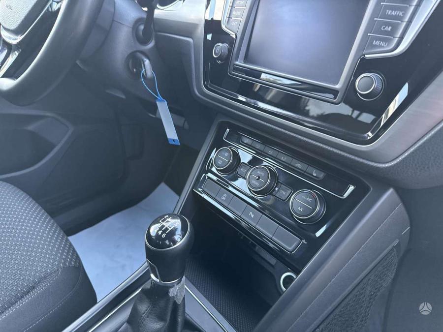 Black Volkswagen Touran 2016 in Ukmerge, with an engine capacity of 1.20 L and mileage of 250 thousand km for 7250 €, photo 15 on AUTOMOTO.COM.LV