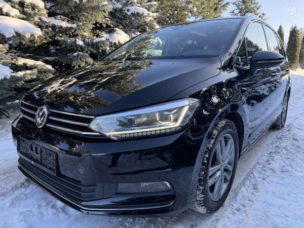 Black Volkswagen Touran 2017 in Utena, with an engine capacity of 2.00 L and mileage of 182 thousand km for 11900 €, photo 1 on AUTOMOTO.COM.LV
