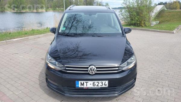 Black Volkswagen Touran 2017 in Aluksne, with an engine capacity of 1.60 L and mileage of 0 thousand km for 10500 €, photo 4 on AUTOMOTO.COM.LV