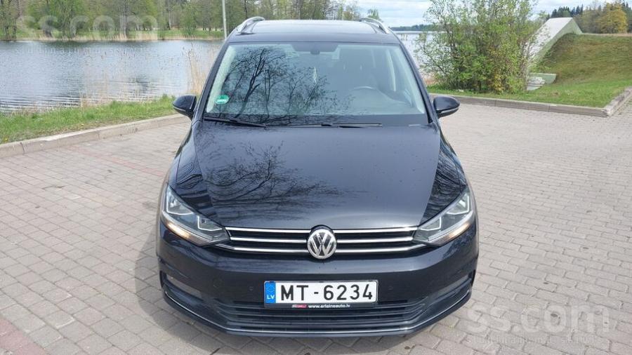 Black Volkswagen Touran 2017 in Aluksne, with an engine capacity of 1.60 L and mileage of 0 thousand km for 10500 €, photo 5 on AUTOMOTO.COM.LV