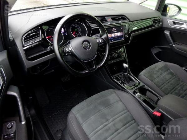 Black Volkswagen Touran 2017 in Riga, with an engine capacity of 2.00 L and mileage of 254 thousand km for 12500 €, photo 6 on AUTOMOTO.COM.LV
