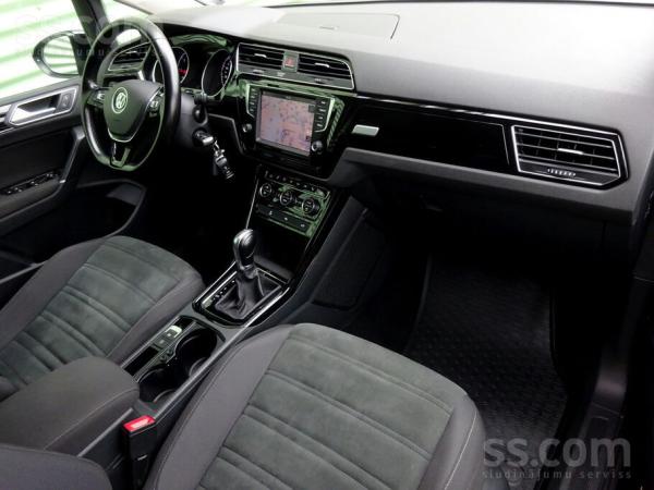 Black Volkswagen Touran 2017 in Riga, with an engine capacity of 2.00 L and mileage of 254 thousand km for 12500 €, photo 8 on AUTOMOTO.COM.LV