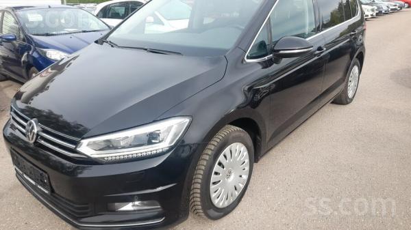Black Volkswagen Touran 2017 in Riga, with an engine capacity of 2.00 L and mileage of 251 thousand km for 11400 €, photo 5 on AUTOMOTO.COM.LV
