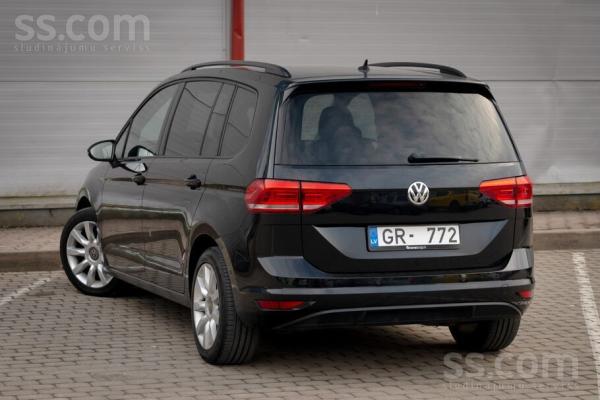 Black Volkswagen Touran 2017 in Tukums, with an engine capacity of 2.00 L and mileage of 298 thousand km for 11950 €, photo 4 on AUTOMOTO.COM.LV