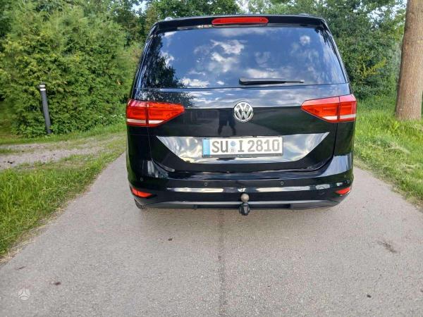Black Volkswagen Touran 2017 in Kaunas, with an engine capacity of 1.60 L and mileage of 170 thousand km for 8999 €, photo 6 on AUTOMOTO.COM.LV