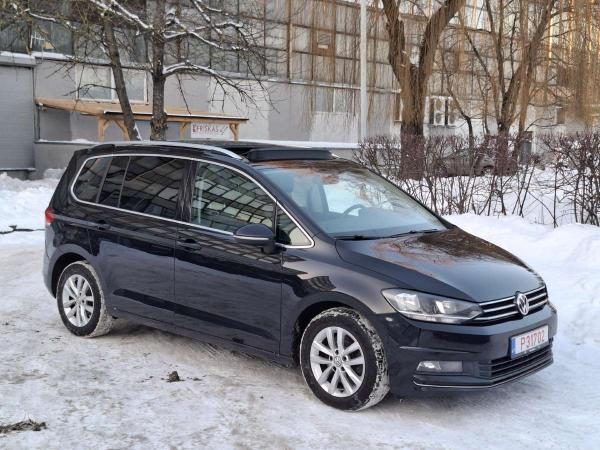 Black Volkswagen Touran 2018 in Vilnius, with an engine capacity of 1.40 L and mileage of 249 thousand km for 10900 €, photo 11 on AUTOMOTO.COM.LV