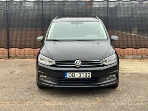 Black Volkswagen Touran 2019 in Riga, with an engine capacity of 1.50 L and mileage of 110 thousand km for 17900 €, photo 8 on AUTOMOTO.COM.LV