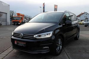 Black Volkswagen Touran 2020 in Kaunas, with an engine capacity of 1.50 L and mileage of 73 thousand km for 27540 €, photo 5 on AUTOMOTO.COM.LV