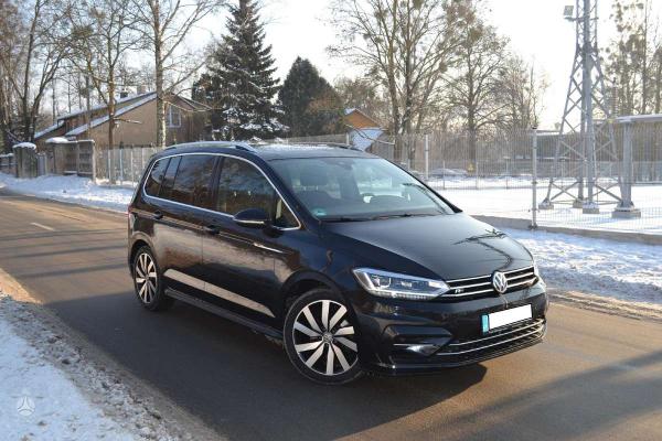 Black Volkswagen Touran 2020 in Kaunas, with an engine capacity of 1.97 L and mileage of 92 thousand km for 17900 €, photo 1 on AUTOMOTO.COM.LV