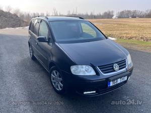 Black Volkswagen Touran 2004 in Tallinn, with an engine capacity of 1.90 L and mileage of 297 thousand km for 1750 €, photo 2 on AUTOMOTO.COM.LV