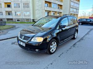 Melns Volkswagen Touran 2004 Tallina, ar dzinēja tilpumu 2.00 L un nobraukumu 543 tūkst. km par 995 €, foto  vietnē AUTOMOTO.COM.LV
