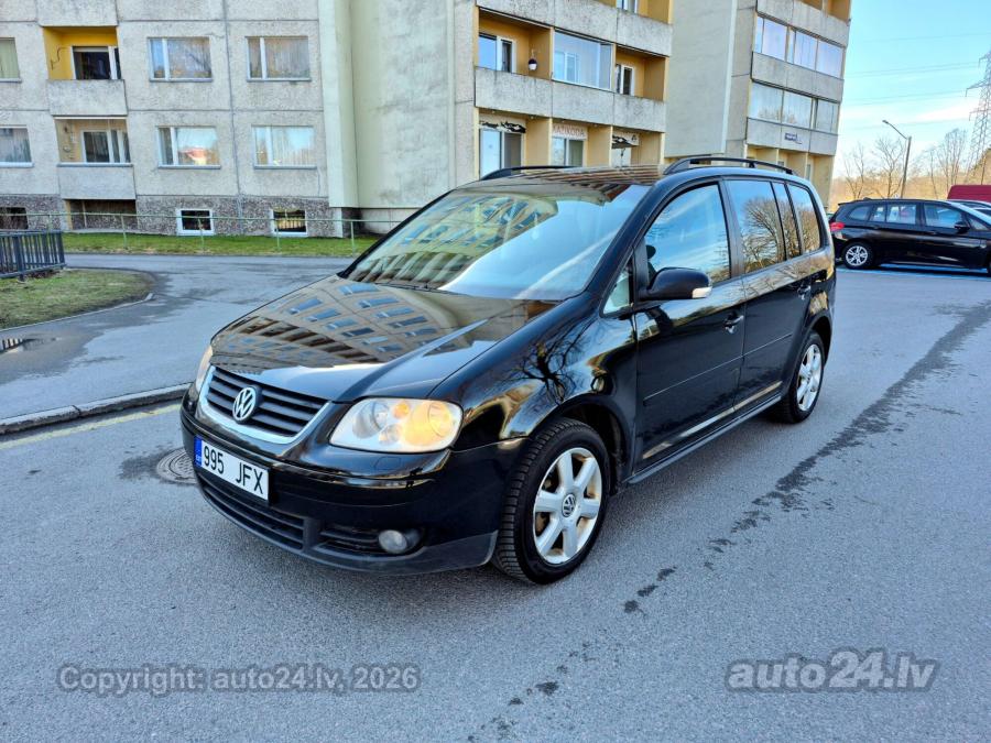 Melns Volkswagen Touran 2004 Tallina, ar dzinēja tilpumu 2.00 L un nobraukumu 543 tūkst. km par 995 €, foto 1 vietnē AUTOMOTO.COM.LV