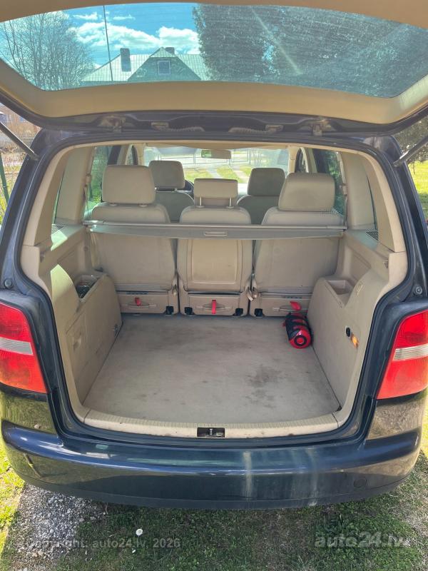 Melns Volkswagen Touran 2005 Tartu, ar dzinēja tilpumu 2.00 L un nobraukumu 476 tūkst. km par 1500 €, foto 6 vietnē AUTOMOTO.COM.LV