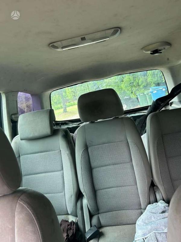 Melns Volkswagen Touran 2005 Kauņa, ar dzinēja tilpumu 1.97 L un nobraukumu 520 tūkst. km par 500 €, foto 10 vietnē AUTOMOTO.COM.LV