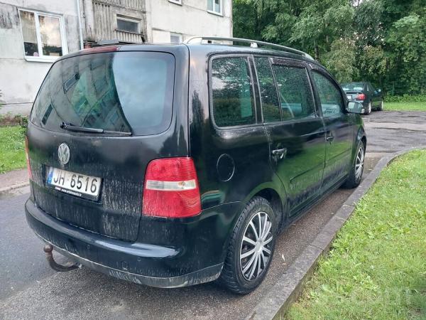 Black Volkswagen Touran 2005 in Dobele, with an engine capacity of 2.00 L and mileage of 292 thousand km for 900 €, photo 2 on AUTOMOTO.COM.LV