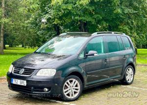 Black Volkswagen Touran 2005 in Tallinn, with an engine capacity of 2.00 L and mileage of 370 thousand km for 1390 €, photo  on AUTOMOTO.COM.LV