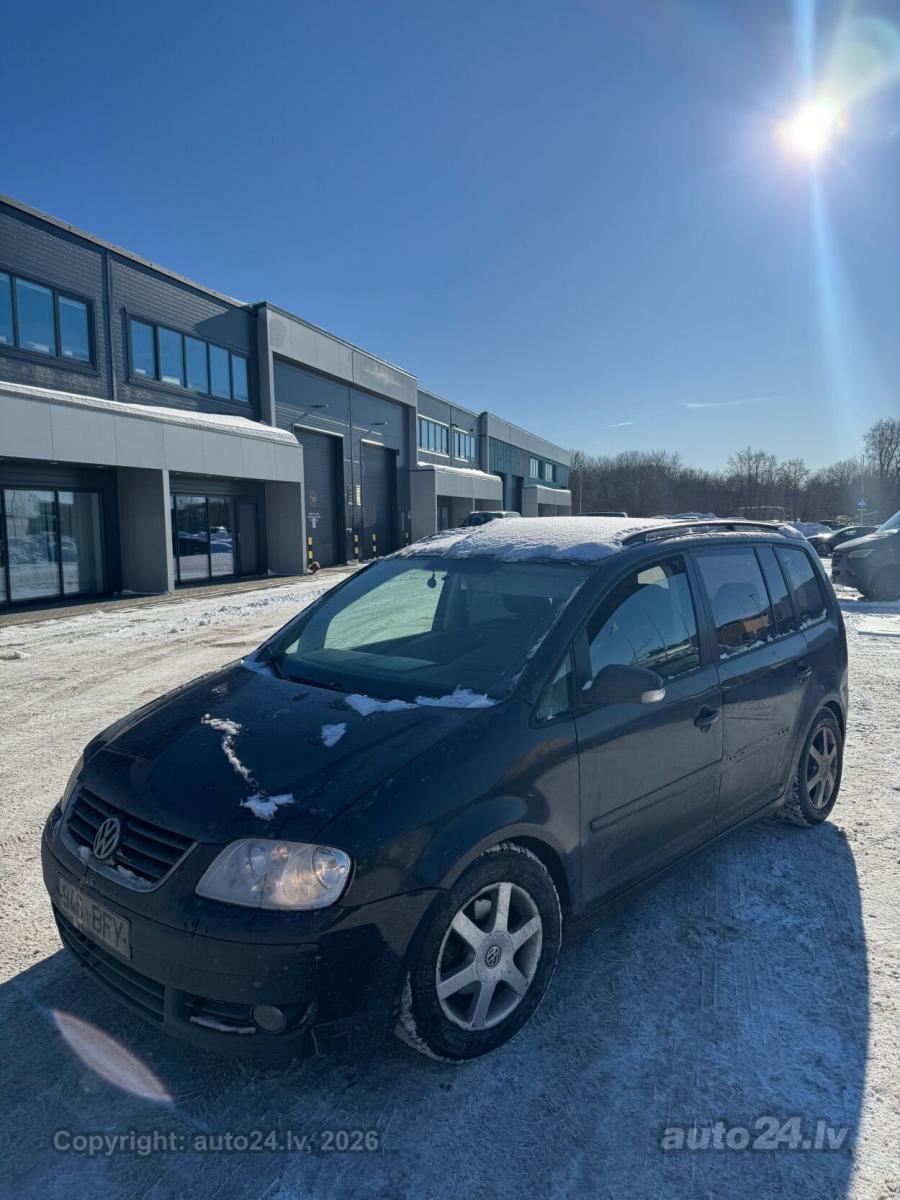 Black Volkswagen Touran 2006 in Tallinn, with an engine capacity of 1.90 L and mileage of 363 thousand km for 1300 €, photo 1 on AUTOMOTO.COM.LV
