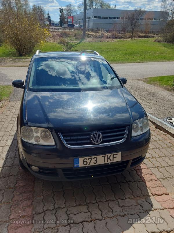 Melns Volkswagen Touran 2006 Tartu, ar dzinēja tilpumu 2.00 L un nobraukumu 299 tūkst. km par 2100 €, foto 1 vietnē AUTOMOTO.COM.LV