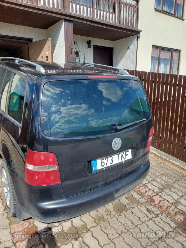 Melns Volkswagen Touran 2006 Tartu, ar dzinēja tilpumu 2.00 L un nobraukumu 299 tūkst. km par 2100 €, foto 6 vietnē AUTOMOTO.COM.LV