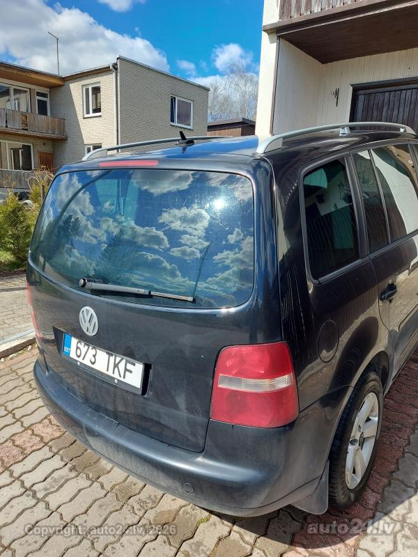 Melns Volkswagen Touran 2006 Tartu, ar dzinēja tilpumu 2.00 L un nobraukumu 299 tūkst. km par 2100 €, foto 7 vietnē AUTOMOTO.COM.LV
