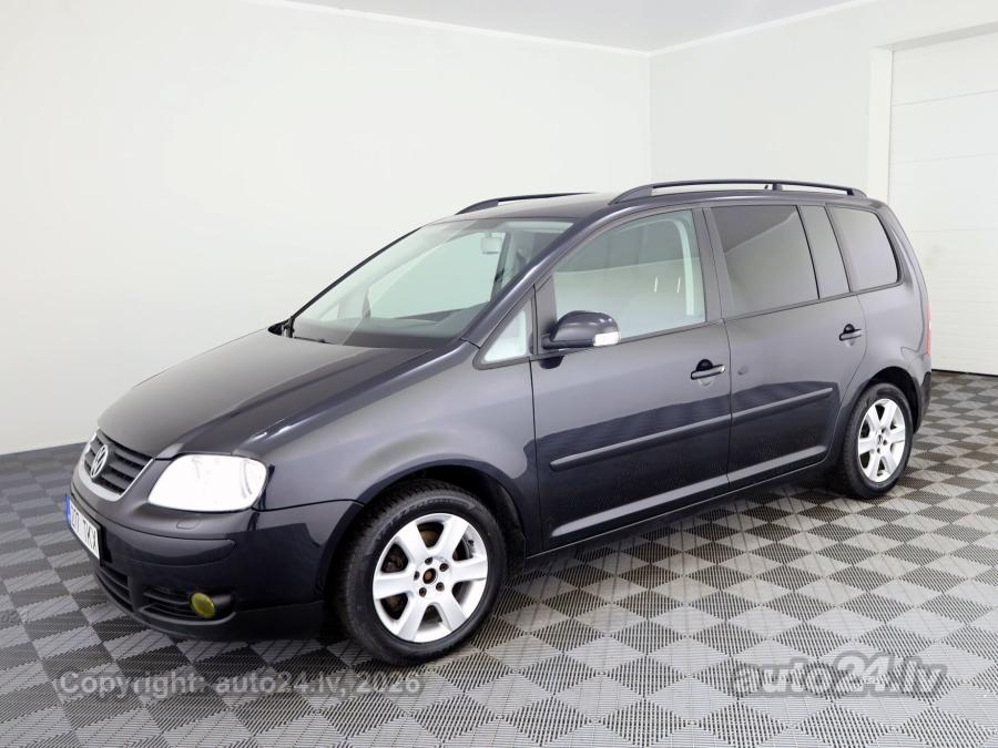 Black Volkswagen Touran 2006 in Tallinn, with an engine capacity of 2.00 L and mileage of 298 thousand km for 1199 €, photo 3 on AUTOMOTO.COM.LV