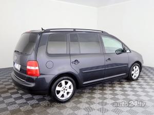 Black Volkswagen Touran 2006 in Tallinn, with an engine capacity of 2.00 L and mileage of 298 thousand km for 1199 €, photo 4 on AUTOMOTO.COM.LV