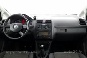 Black Volkswagen Touran 2006 in Tallinn, with an engine capacity of 2.00 L and mileage of 298 thousand km for 1199 €, photo 6 on AUTOMOTO.COM.LV