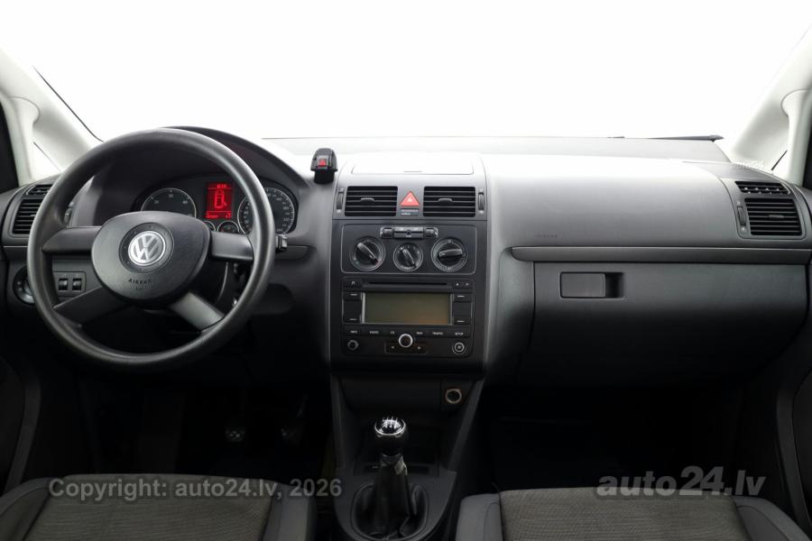 Black Volkswagen Touran 2006 in Tallinn, with an engine capacity of 2.00 L and mileage of 298 thousand km for 1199 €, photo 6 on AUTOMOTO.COM.LV