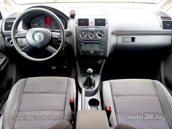 Melns Volkswagen Touran 2006 Tallina, ar dzinēja tilpumu 2.00 L un nobraukumu 390 tūkst. km par 1899 €, foto 9 vietnē AUTOMOTO.COM.LV