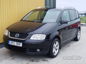 Black Volkswagen Touran 2006 in Tartu, with an engine capacity of 2.00 L and mileage of 300 thousand km for 1990 €, photo  on AUTOMOTO.COM.LV